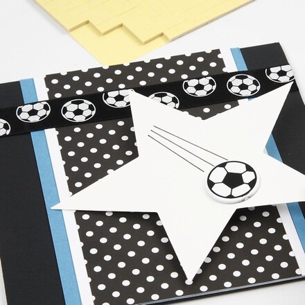 Fodboldkort i blå og sort