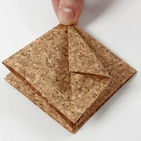 Origami fugl ophængt med perler