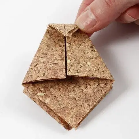 Origami fugl ophængt med perler