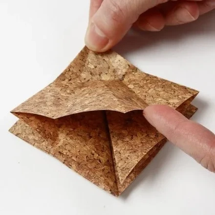 Origami fugl ophængt med perler