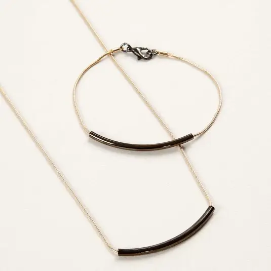 Halskæde & armbånd med buede vedhæng