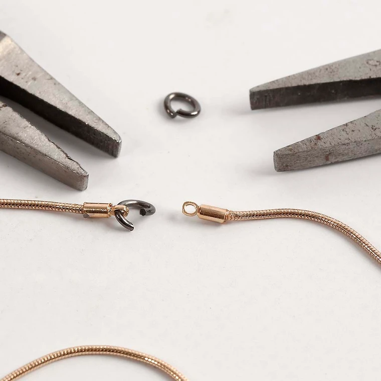 Halskæde & armbånd med buede vedhæng